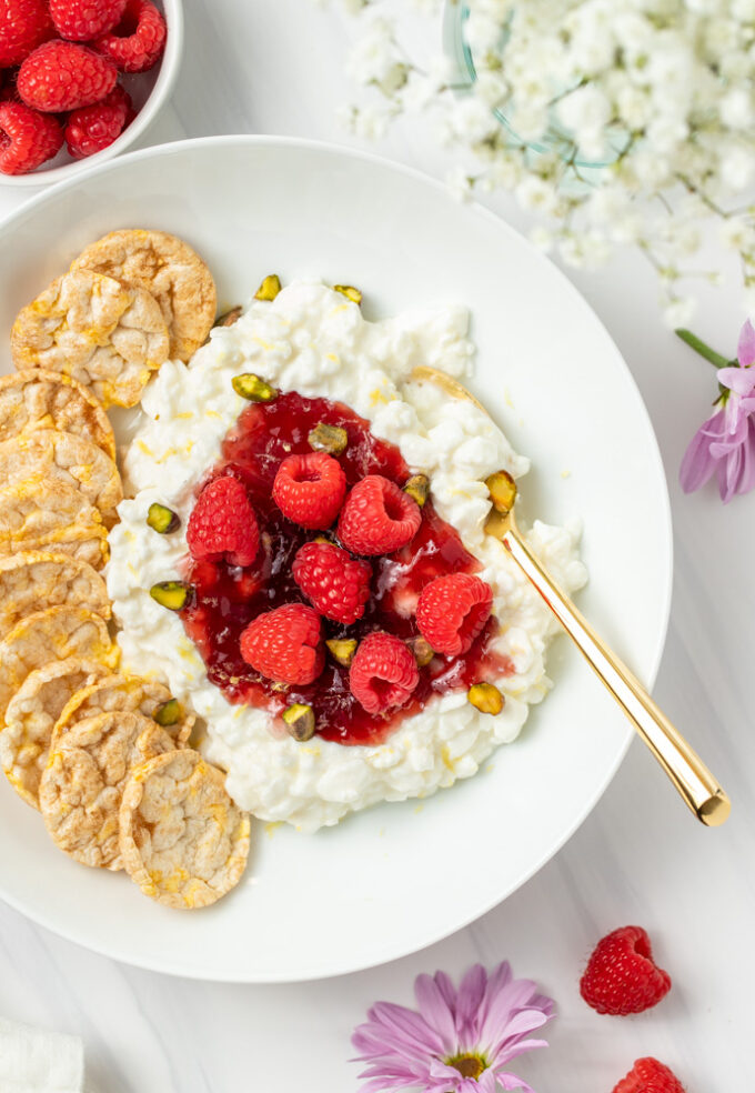 Raspberry Cottage Cheese Snack Bowl - Peanut Butter and Fitness